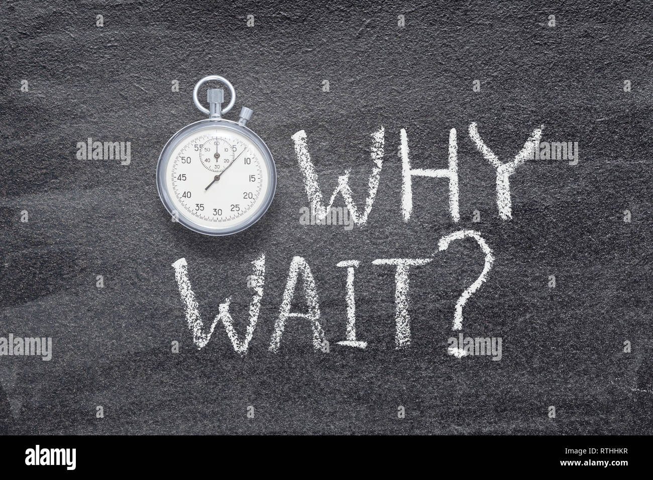 why wait question written on chalkboard with vintage precise stopwatch ...