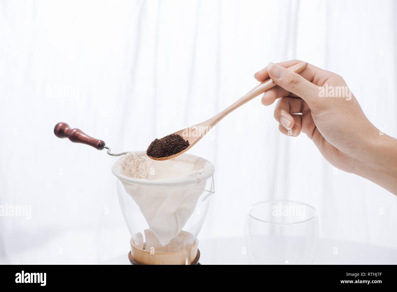Man spills coffee powder to Drip Coffee Stock Photo - Alamy