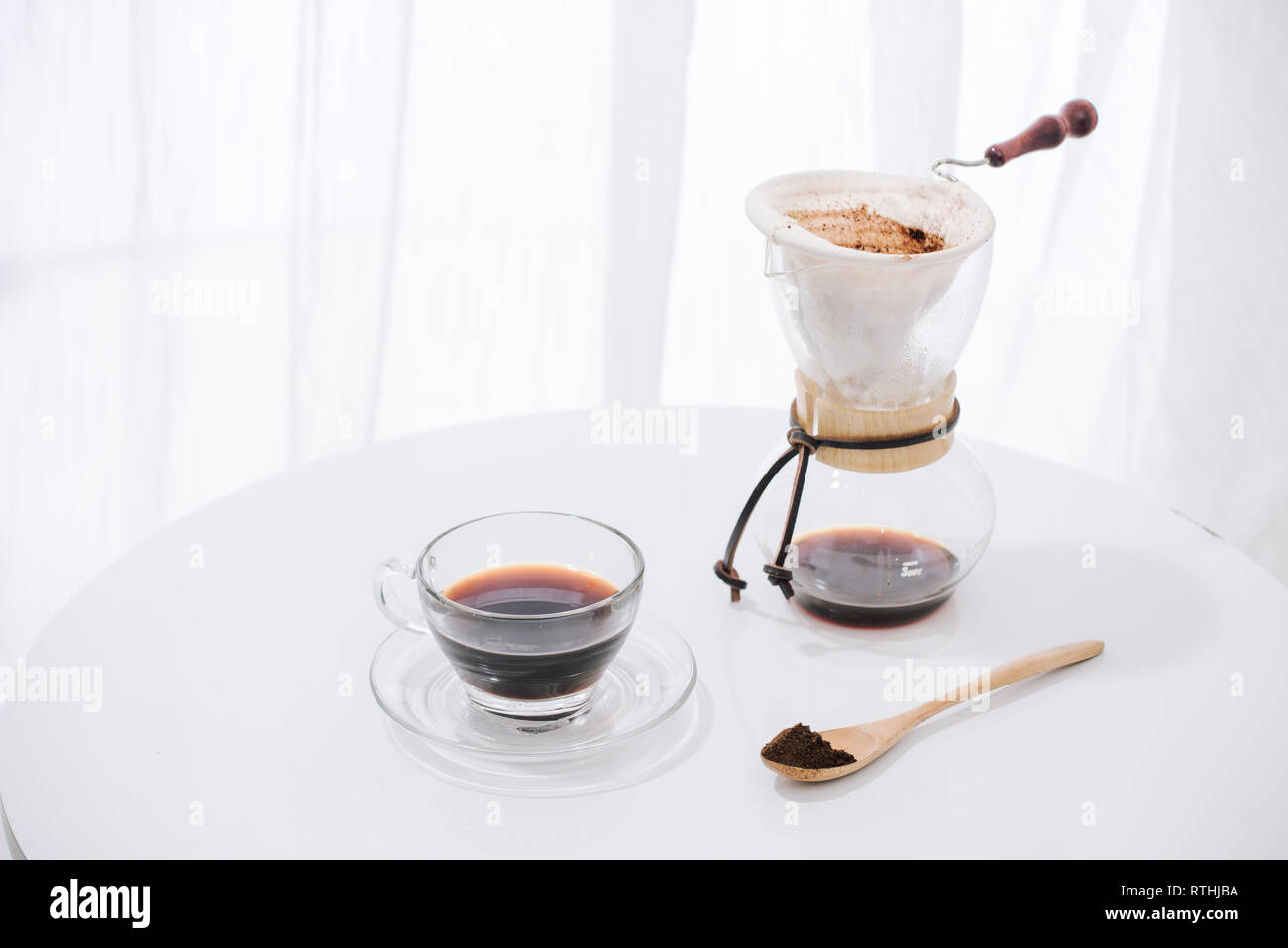 Pour over drip process coffee in retro filter effect with copy space ...