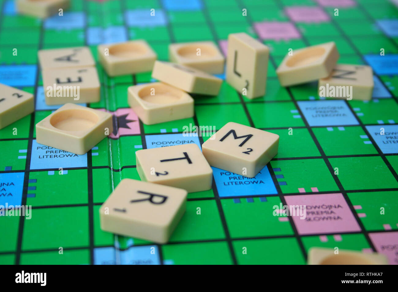 picture of mess on the scrabble board Stock Photo - Alamy