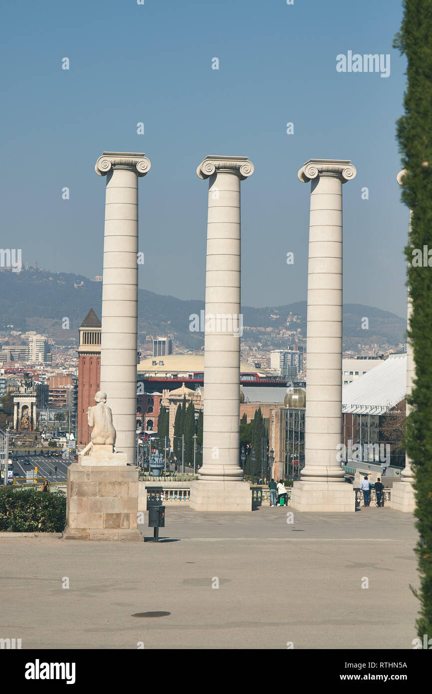 Big, strong stone columns on the street in Barcelona in Spain, hill ...