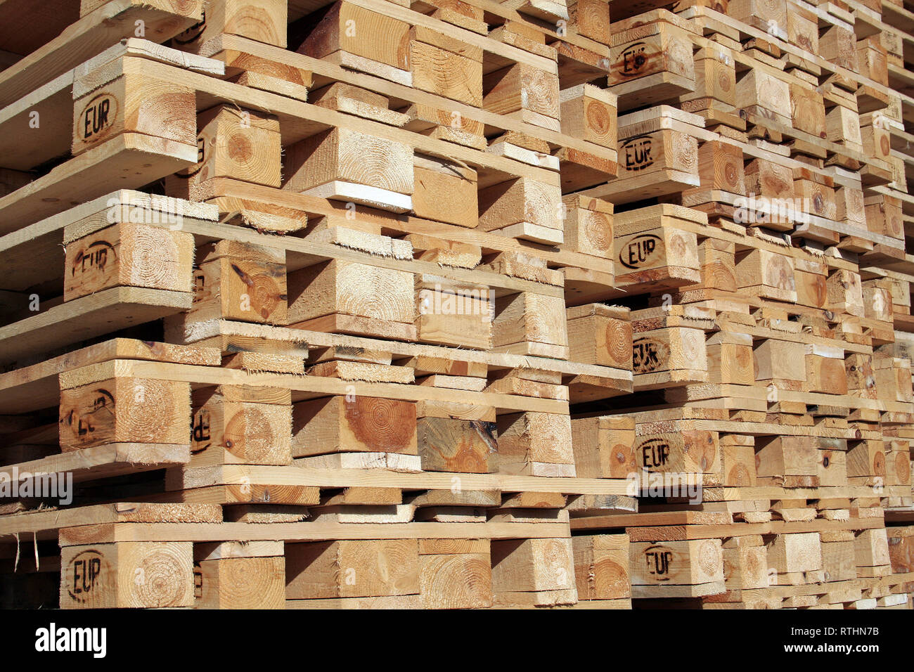 palettes in the werehouse Stock Photo - Alamy