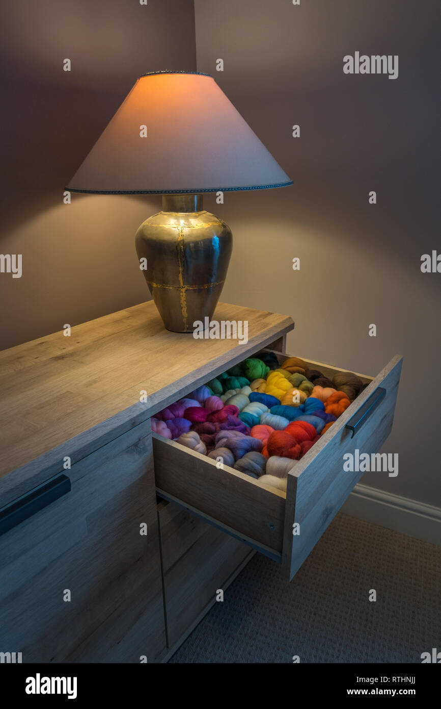 Craft drawer full of brightly coloured merino wool tops for needle ...