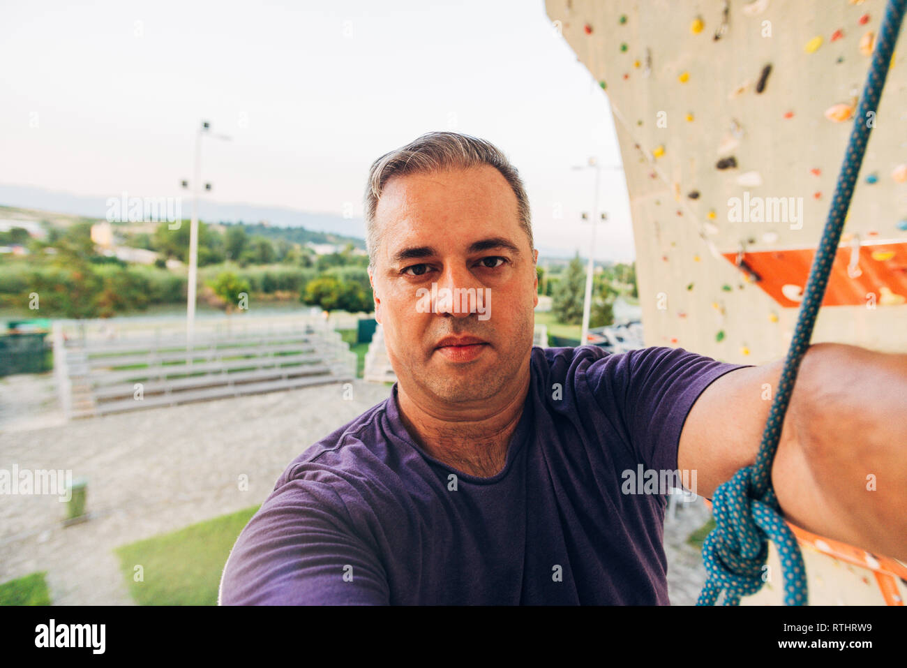 Close up photo of climber man while practicing bouldering Stock Photo ...
