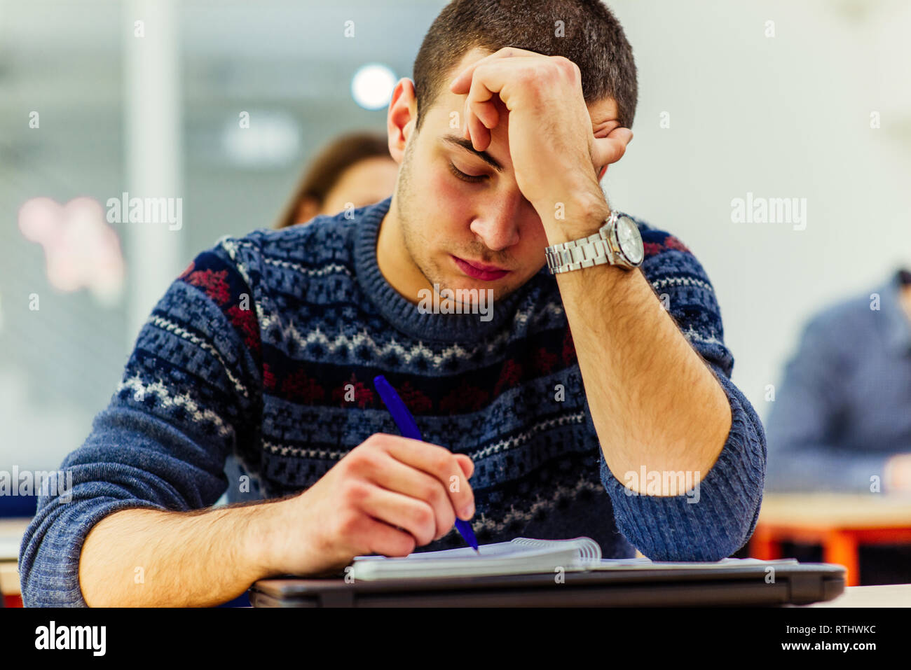 Modern student taking a test with her high school class Stock Photo - Alamy
