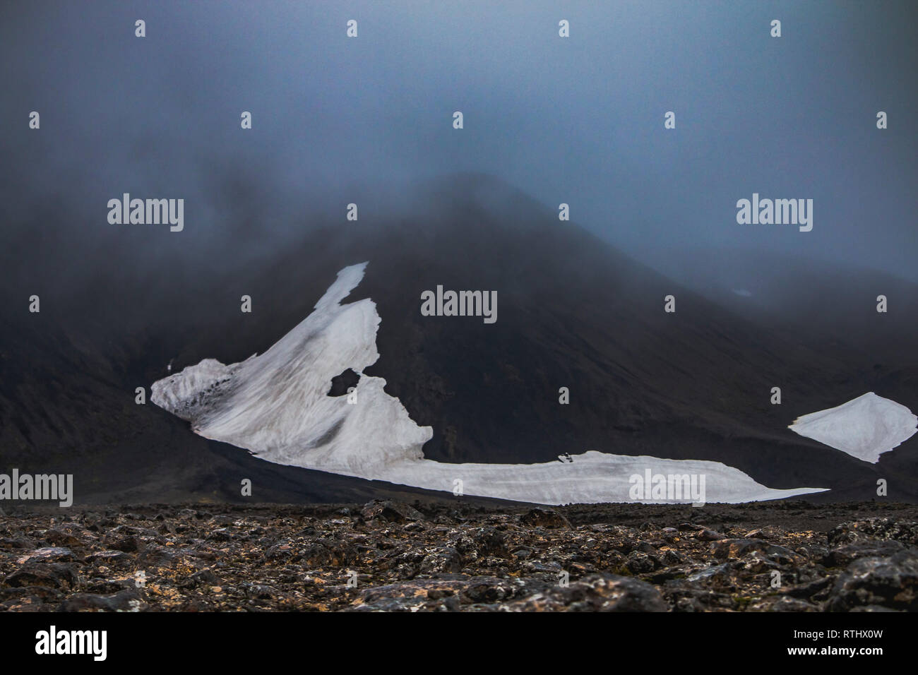Snow patch looks like alien head on mountain in Highlands of Iceland at ...