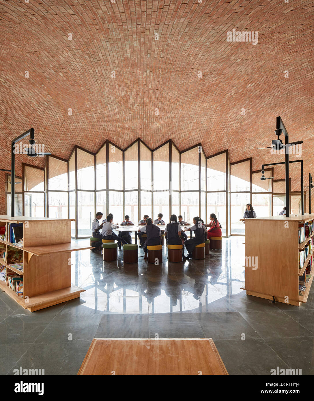 Interior view with students at work. Maya Somaiya Library, Kopargaon ...