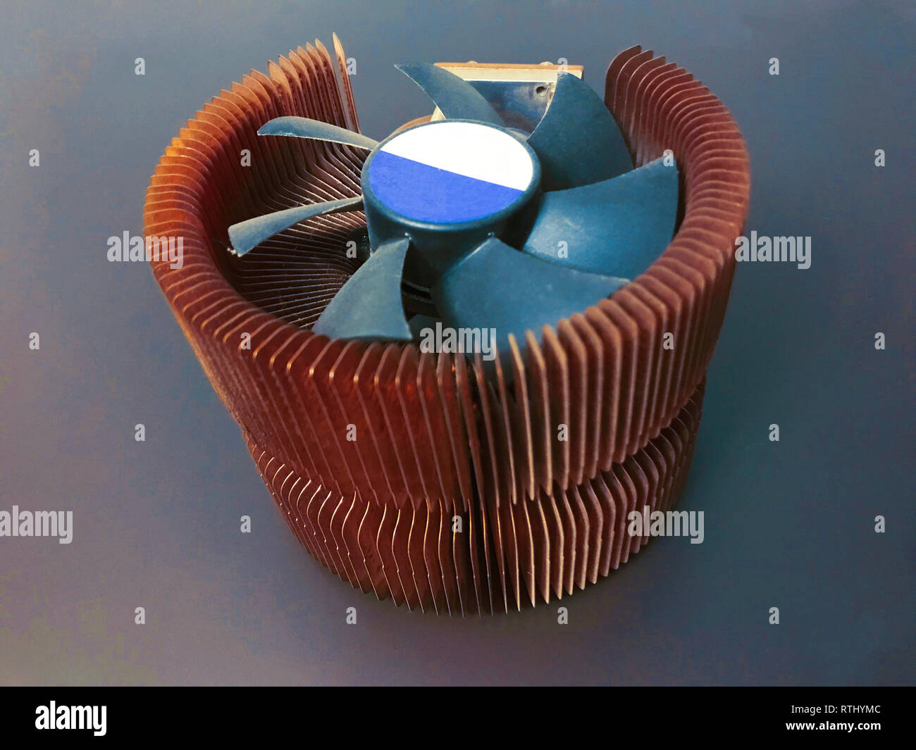 CPU cooler with copper plates on a gray background Stock Photo - Alamy