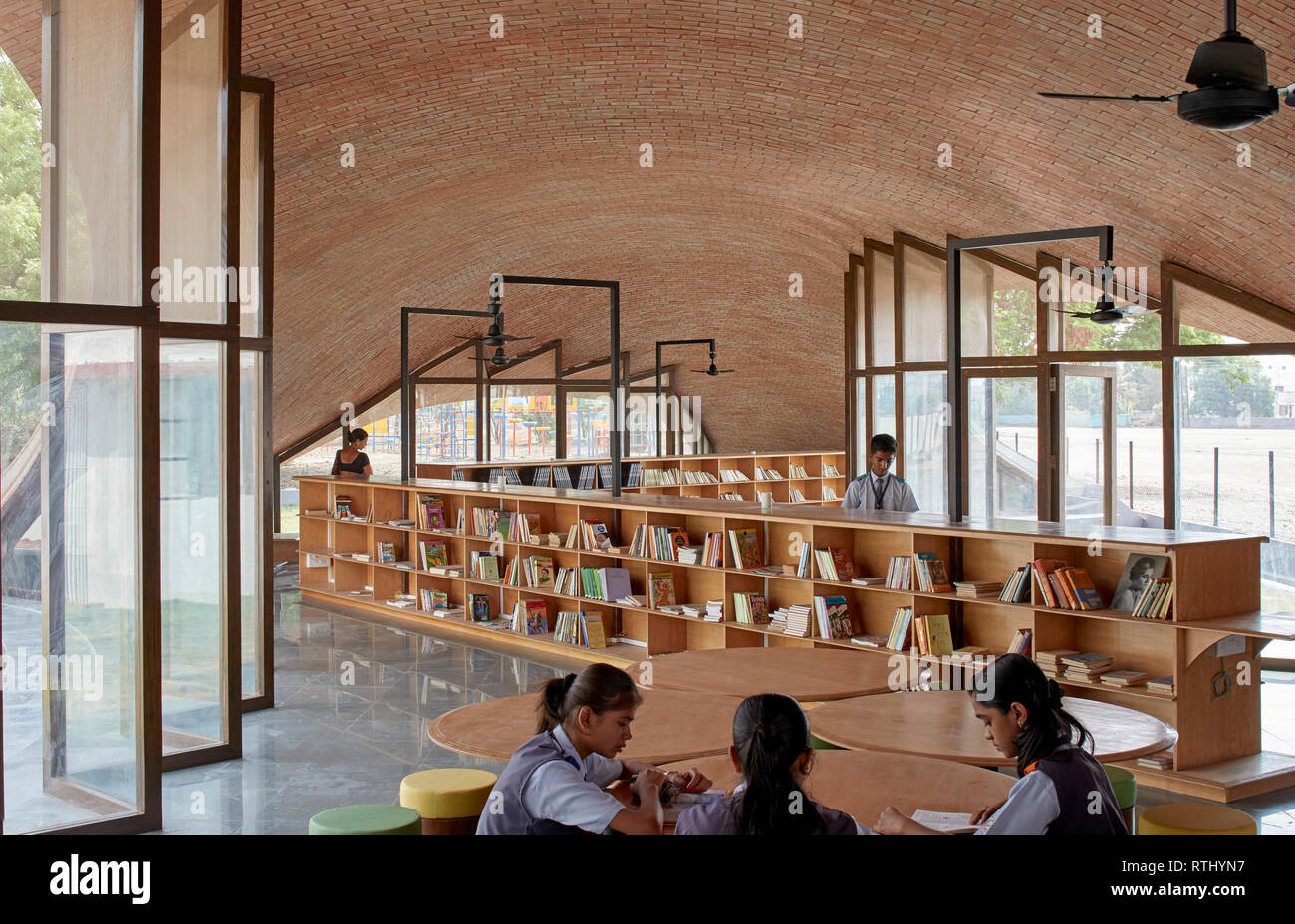 Interior view with students at work. Maya Somaiya Library, Kopargaon ...