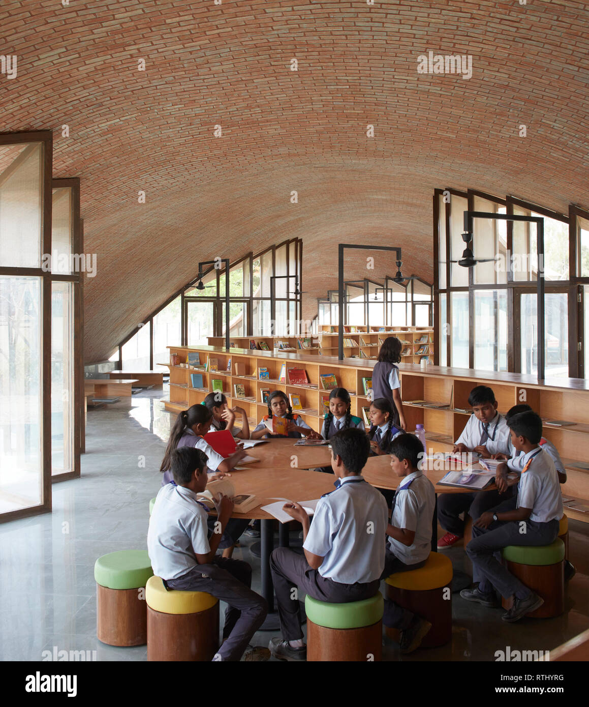 Interior view with students at work. Maya Somaiya Library, Kopargaon ...