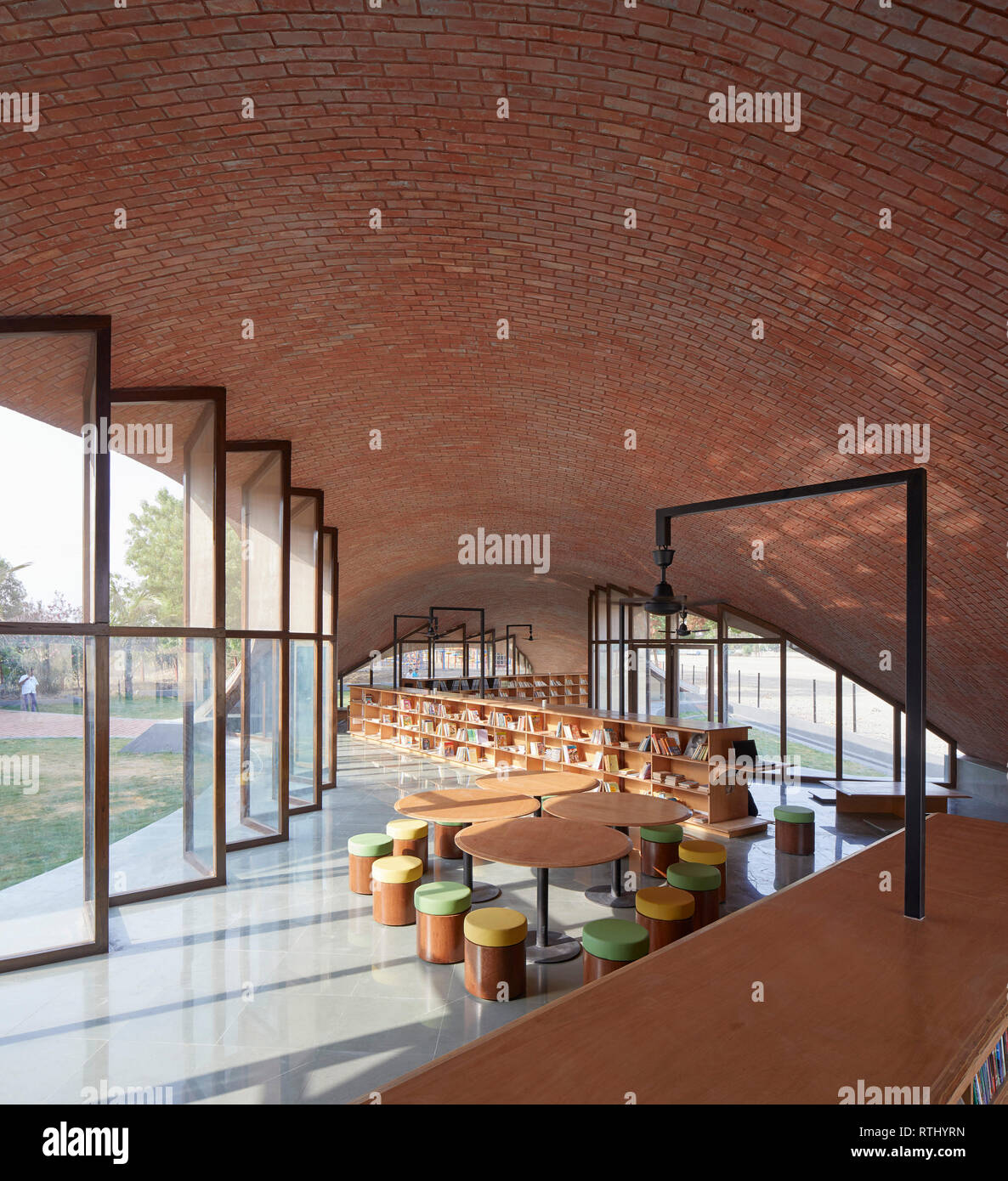 Interior view with late afternoon sun. Maya Somaiya Library, Kopargaon ...