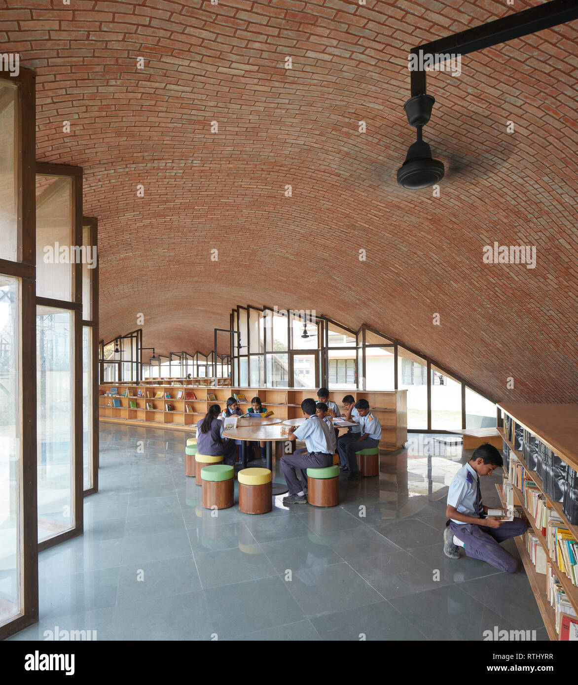 Interior view with students at work. Maya Somaiya Library, Kopargaon ...