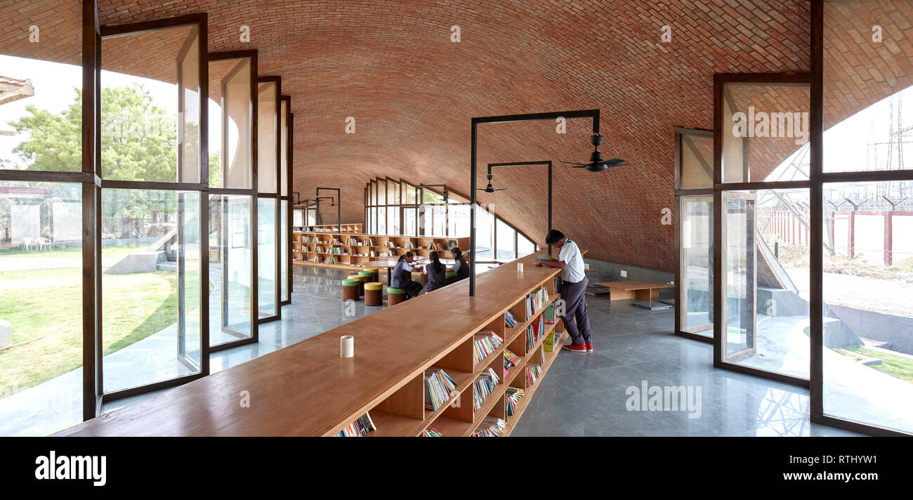 Interior view with students at work. Maya Somaiya Library, Kopargaon ...