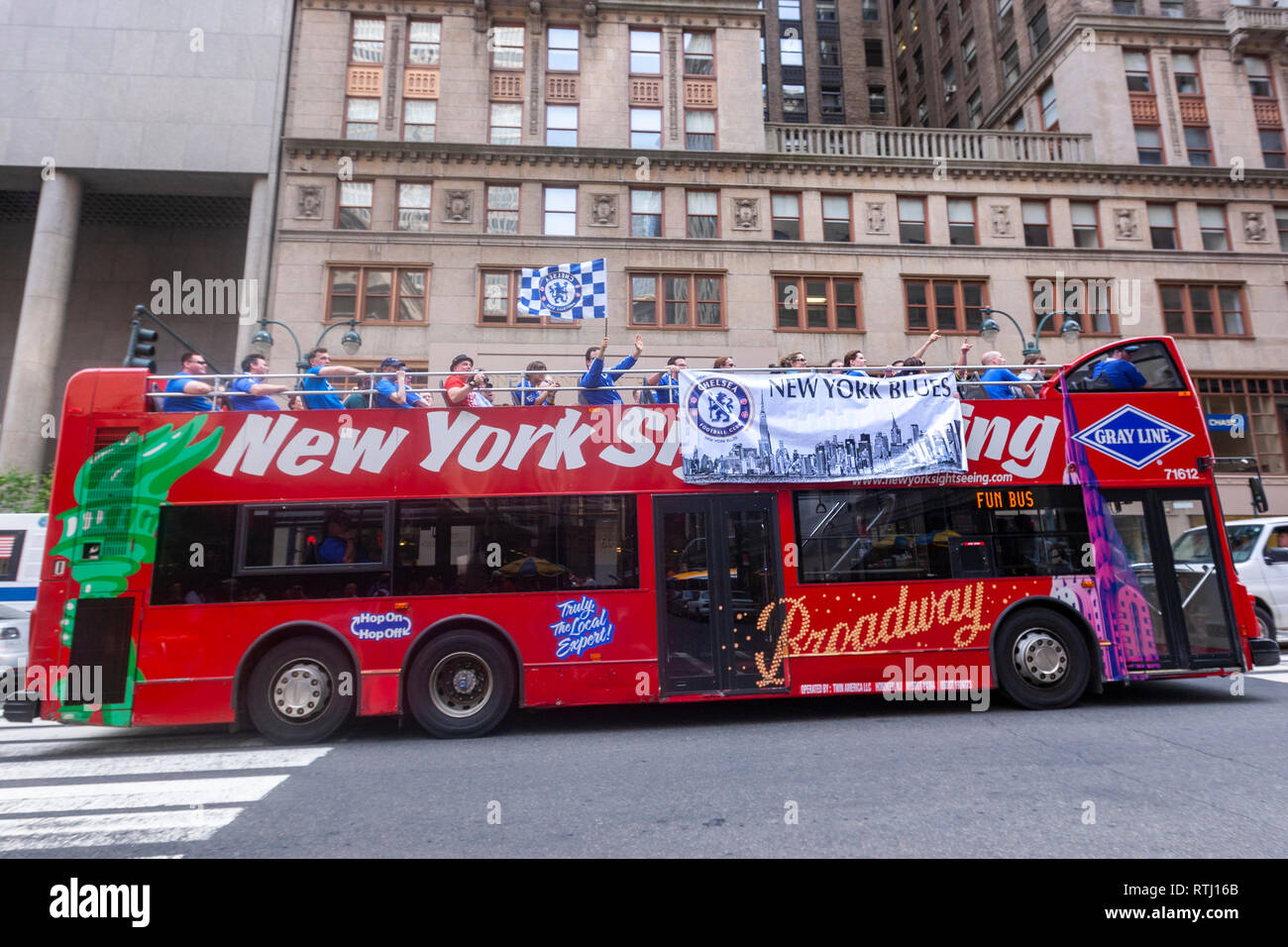 Chelsea supporters in a New York sightseeing bus outside the Grand ...