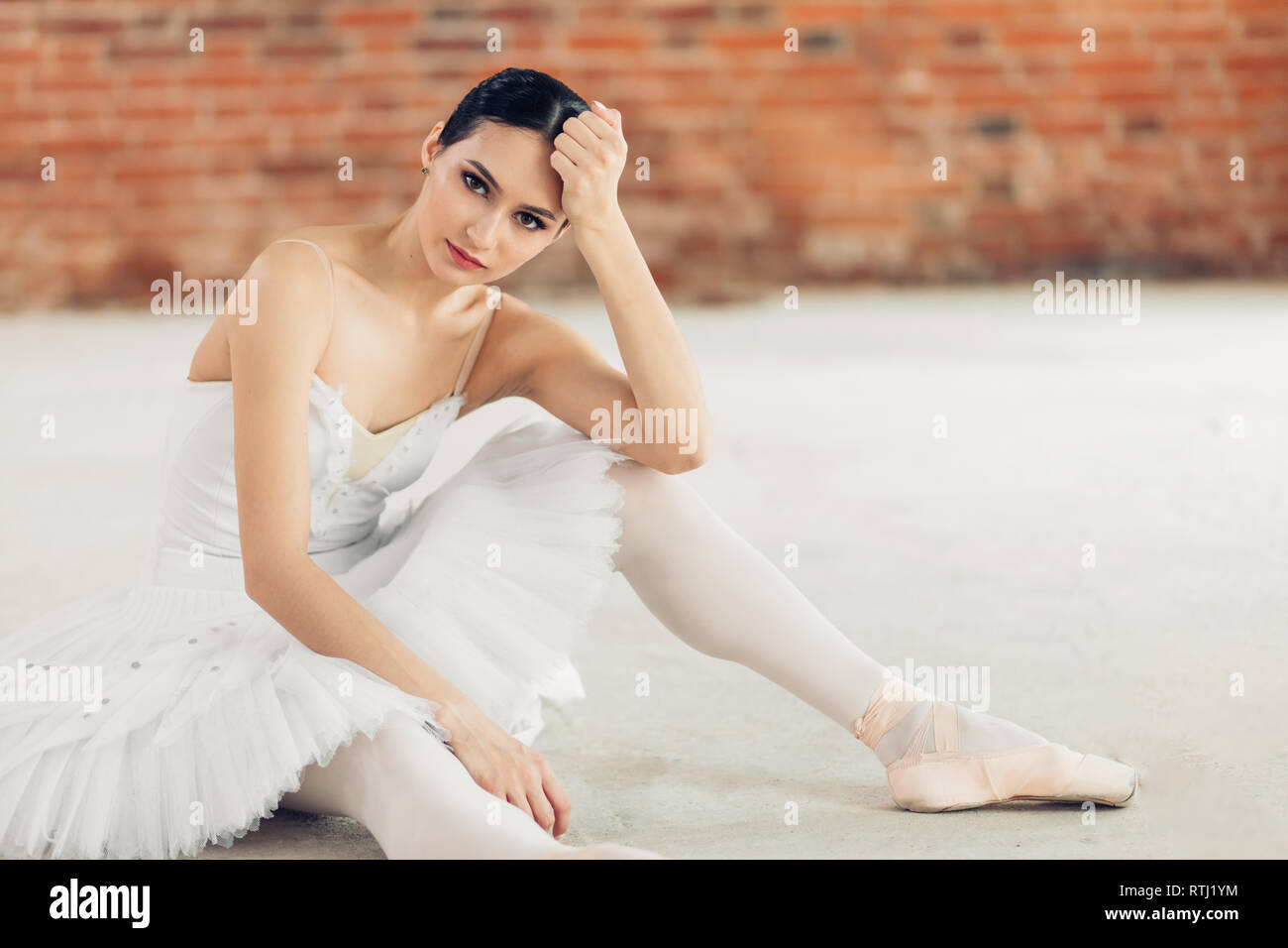 Young ballerina resting in ballet hi-res stock photography and images ...