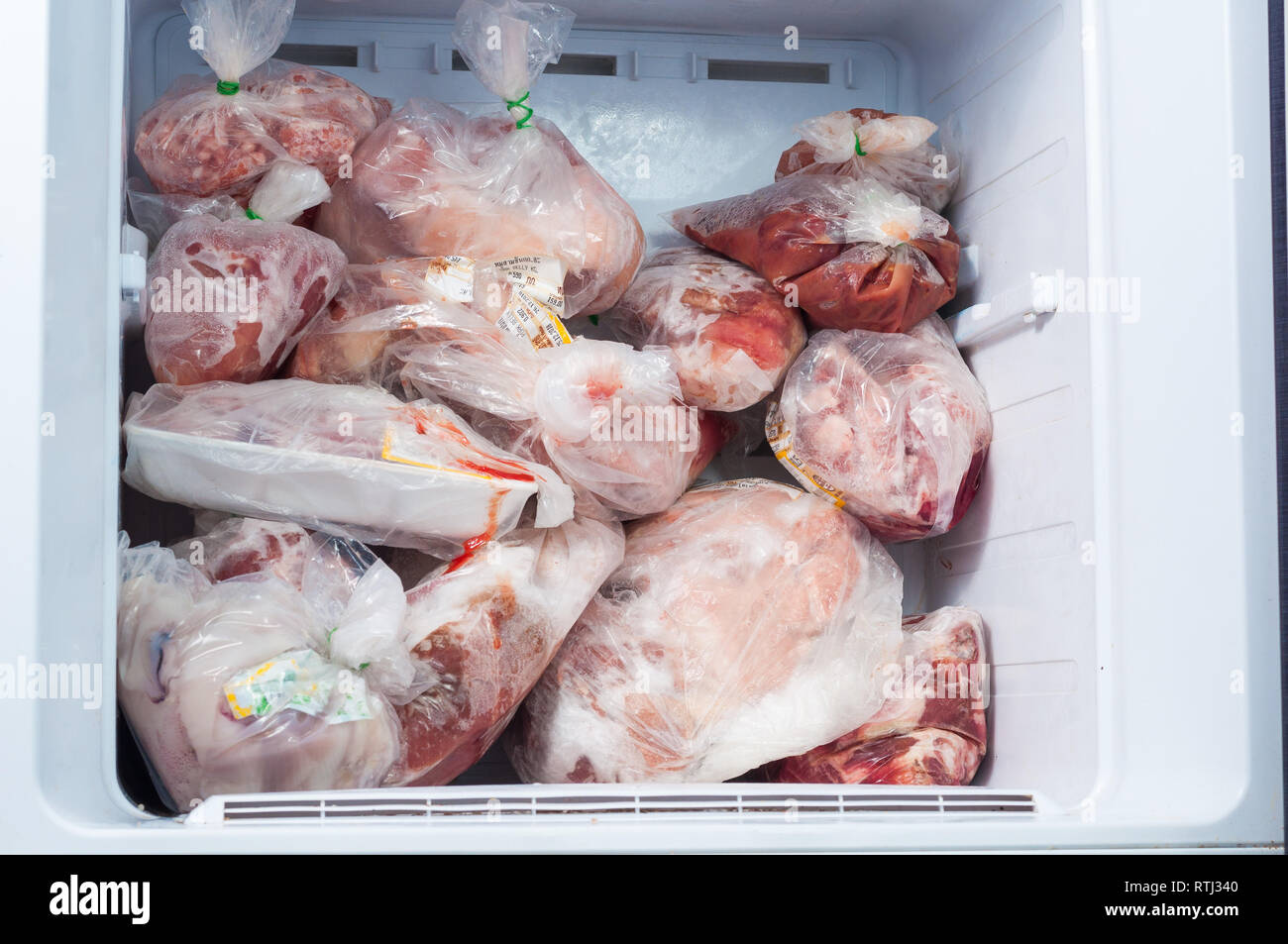 Close up meat raw full tight in freezer refrigerator background Stock ...