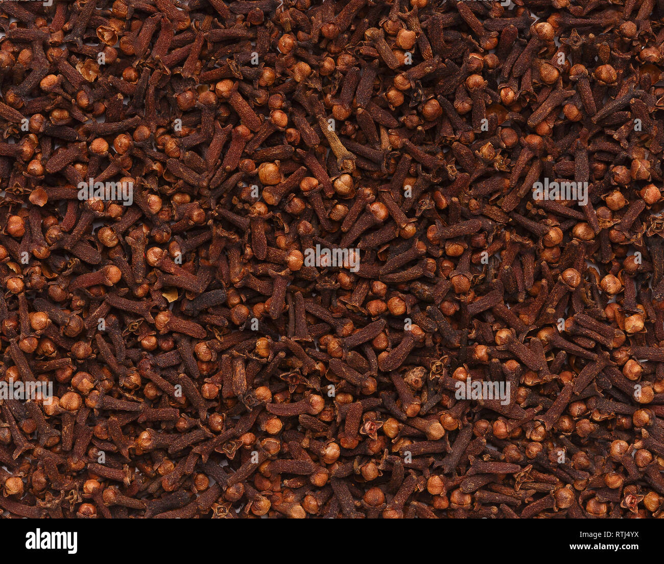 Cloves condiment texture, aromatic spice background closeup Stock Photo ...