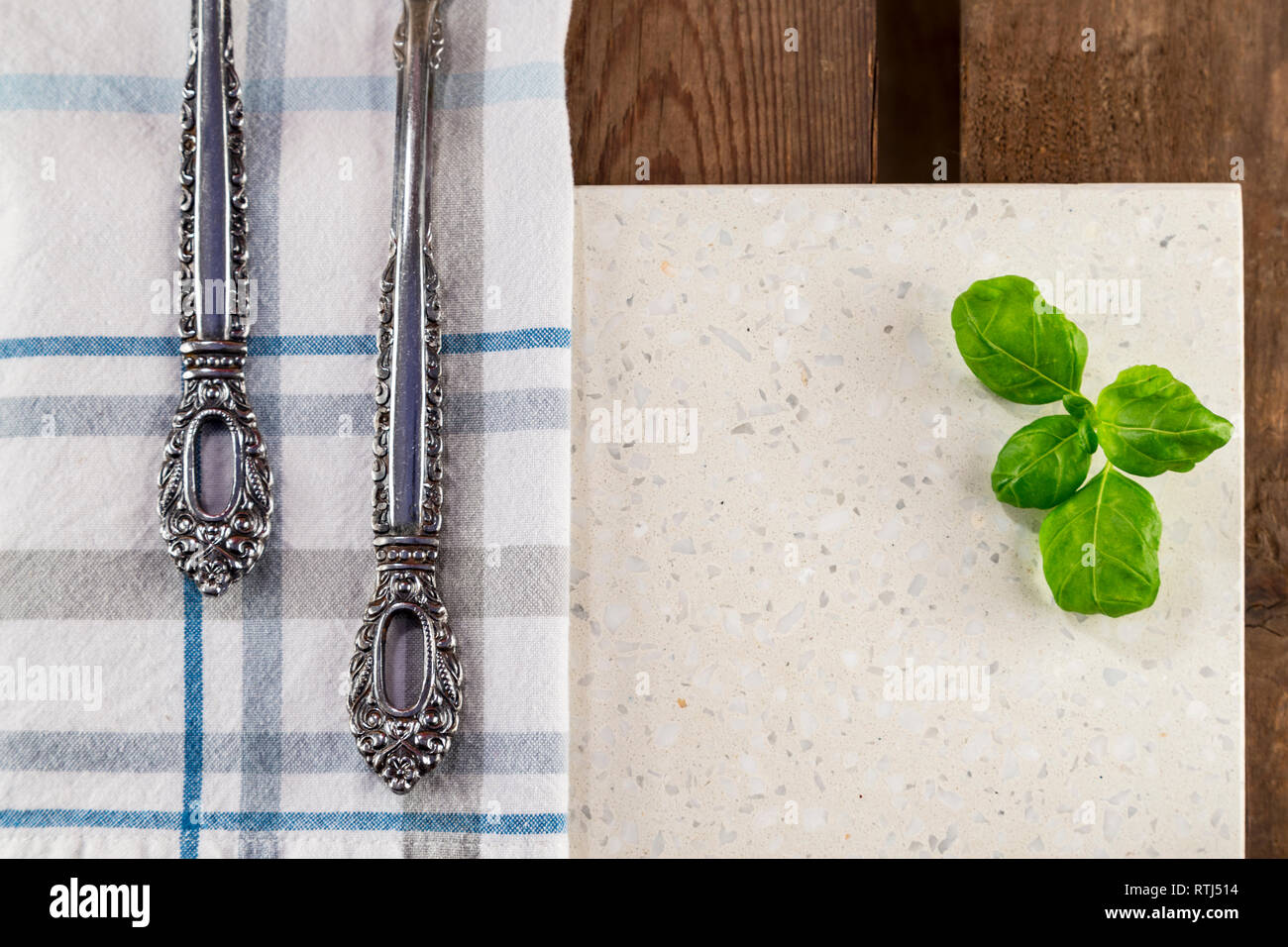 Concrete stone server with space for text on rustic wood plank surface ...