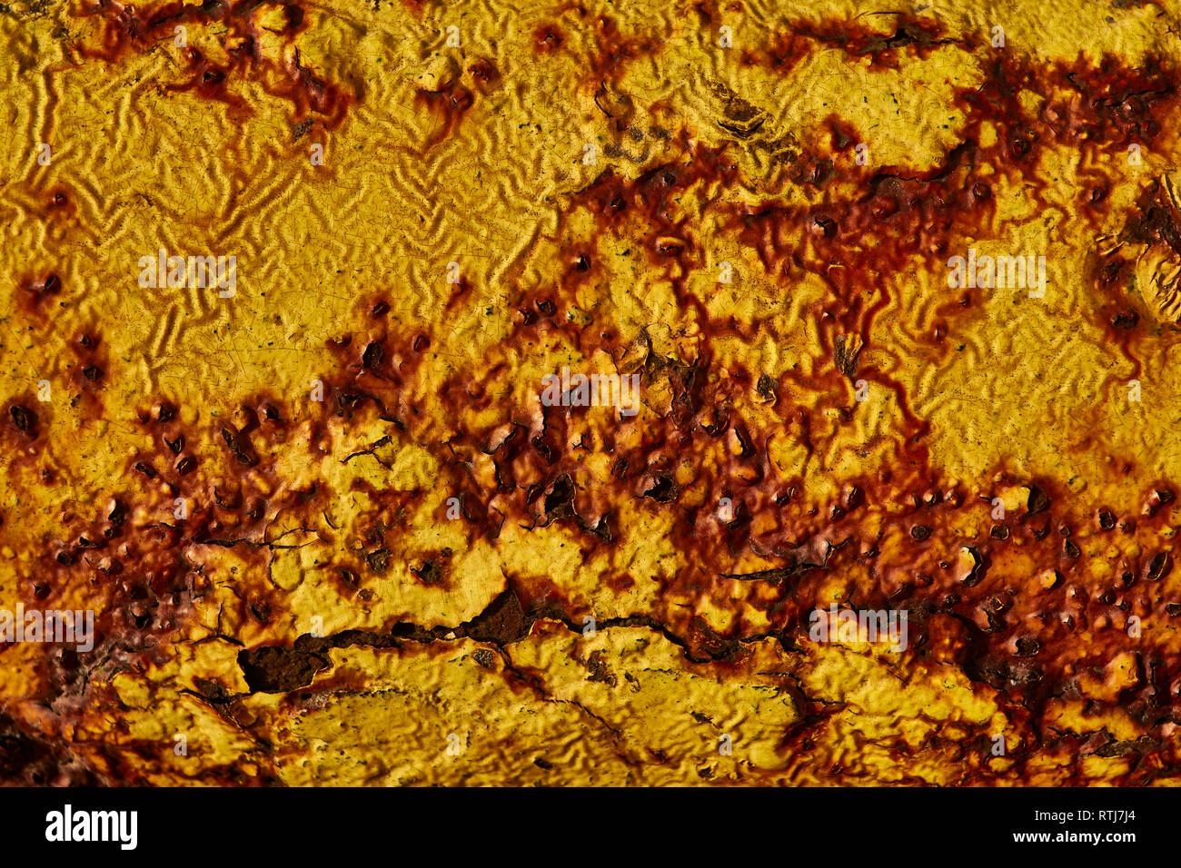 Yellow rusted textured metal close up abstract Stock Photo - Alamy