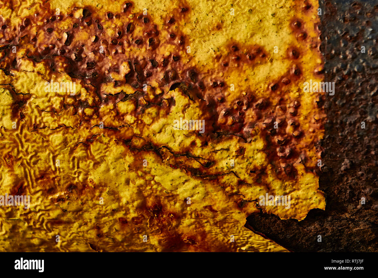 Yellow rusted textured metal close up abstract Stock Photo - Alamy
