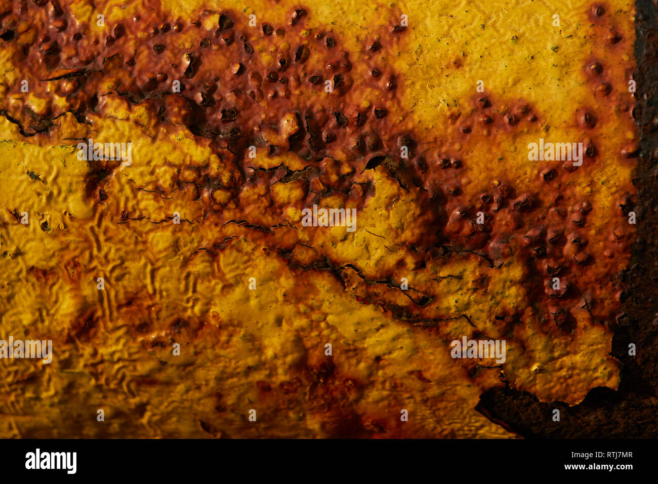 Yellow rusted textured metal close up abstract Stock Photo - Alamy