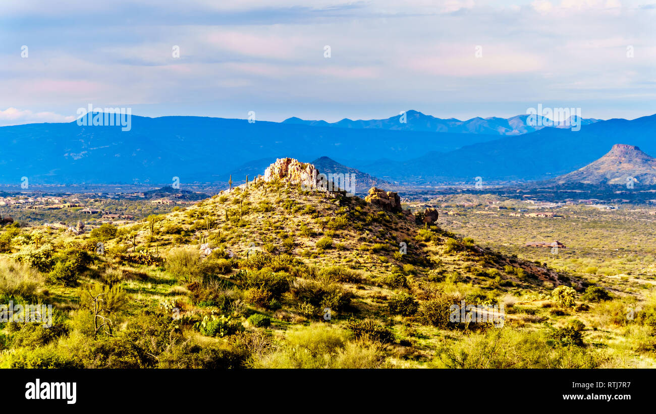 View of the Valley of the Sun and the rugged rocky mountains in the ...