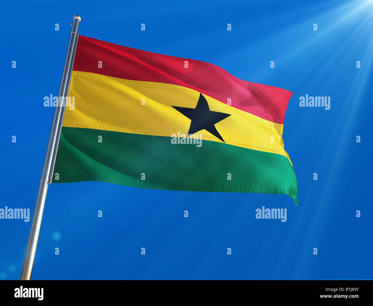 Ghana National Flag Waving on pole against deep blue sky background ...