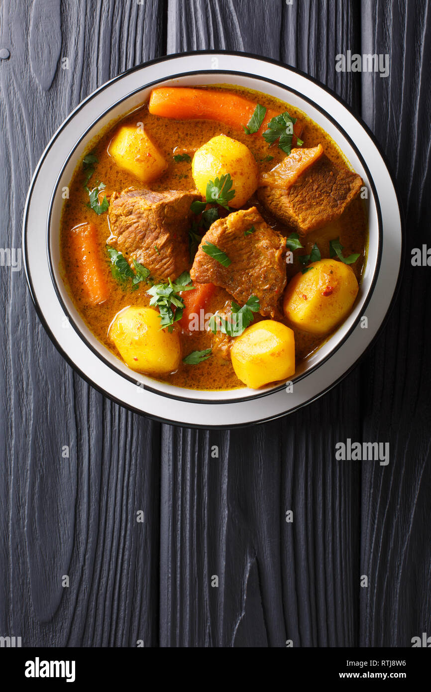 Namibia Potjiekos traditional lamb dish with vegetables close-up in a ...