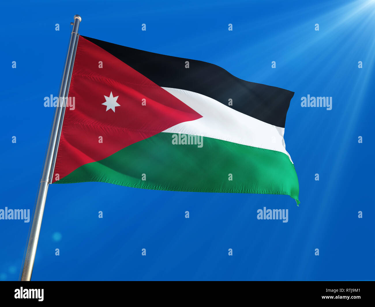 Jordan National Flag Waving on pole against deep blue sky background ...