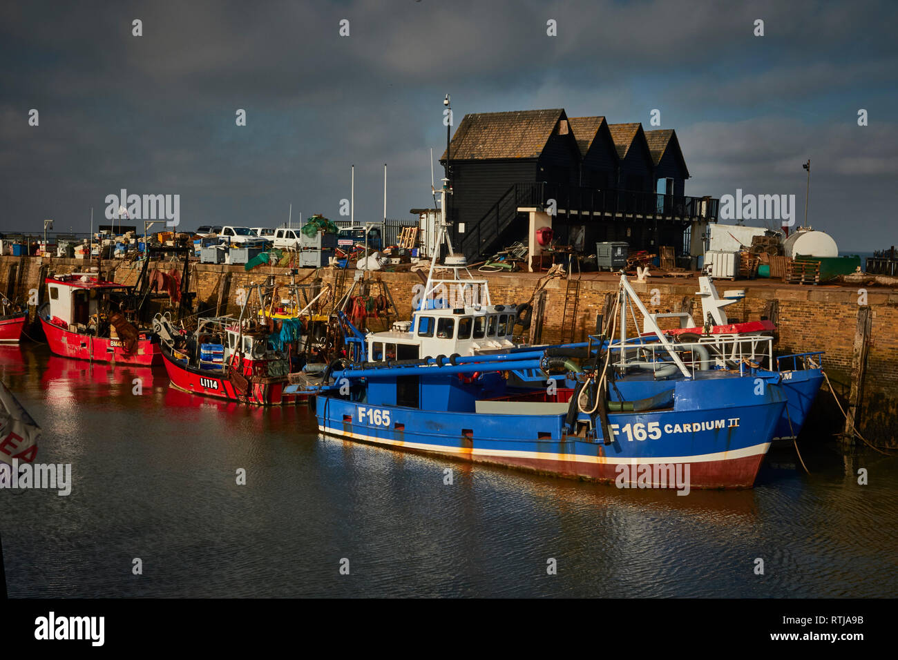 Boats in the Whitstable harbour area of Kent, England, United Kingdom ...