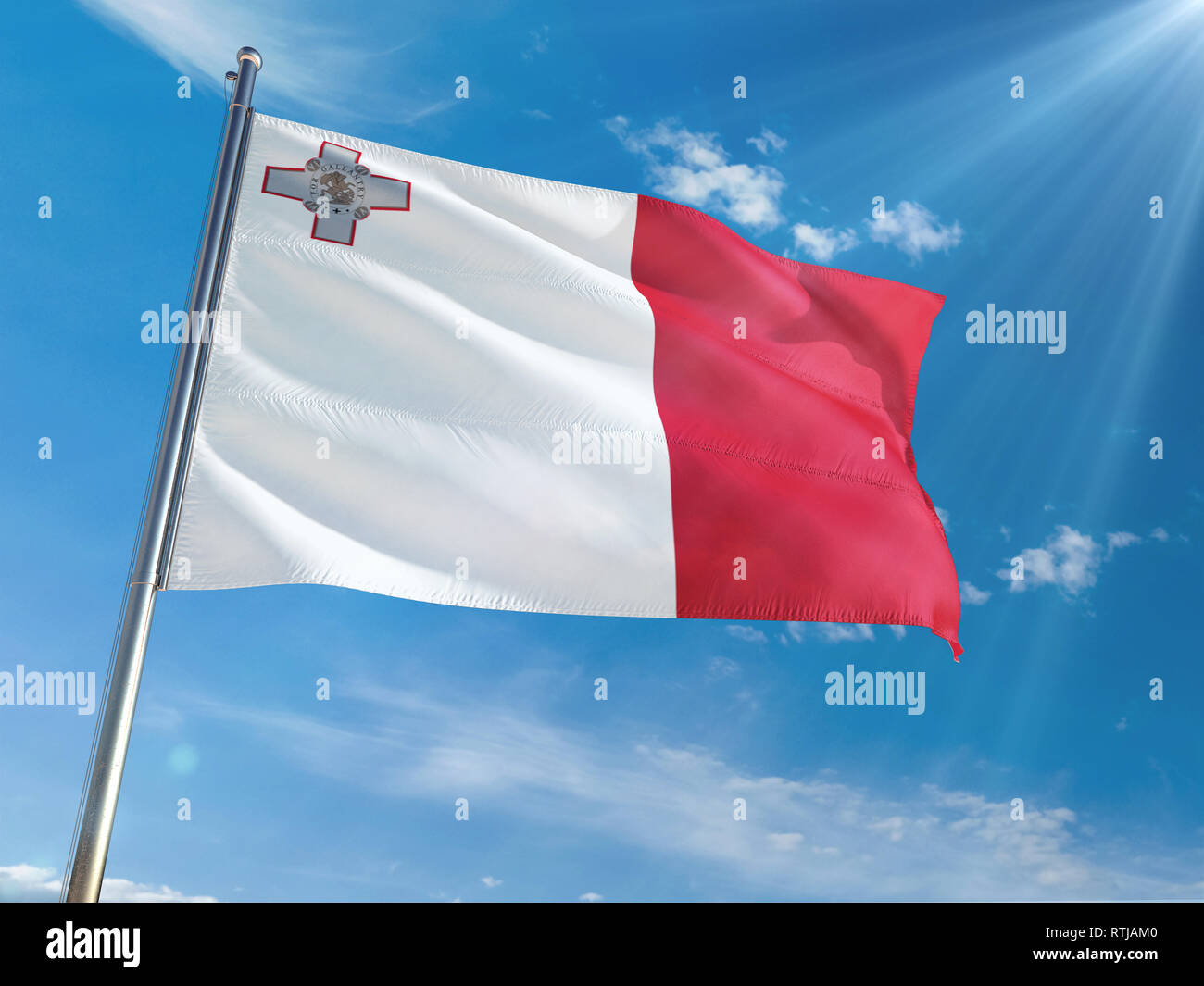 Malta National Flag Waving on pole against sunny blue sky background ...
