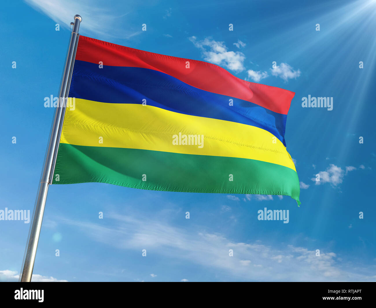 Mauritius National Flag Waving on pole against sunny blue sky ...