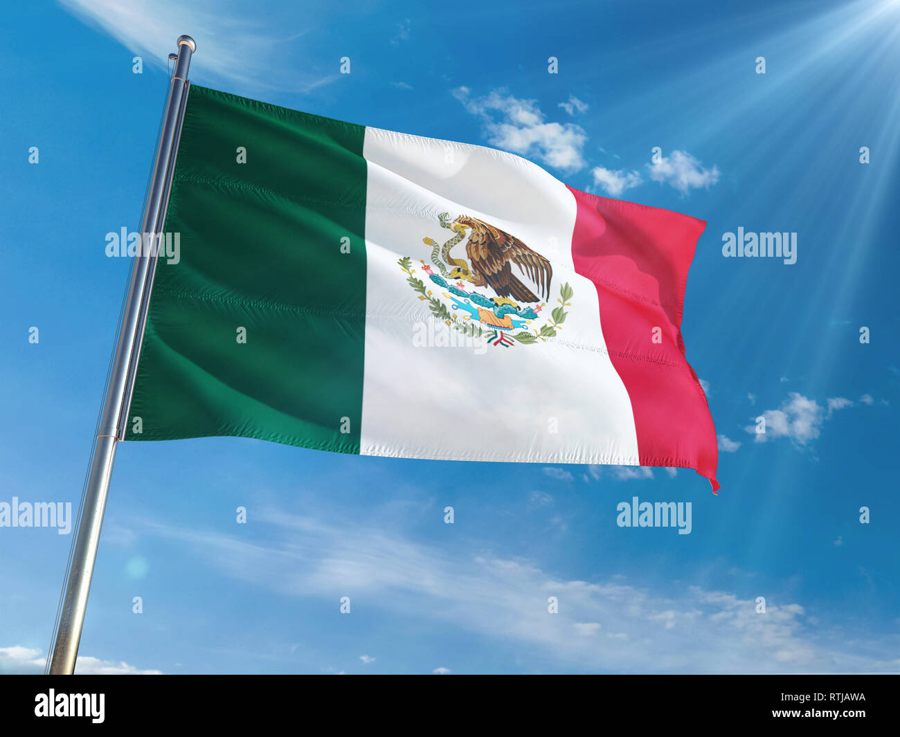 Mexico National Flag Waving on pole against sunny blue sky background ...
