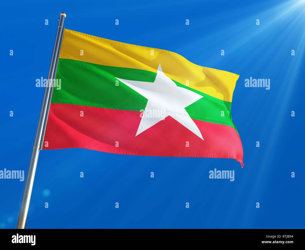 Myanmar - Burma National Flag Waving on pole against deep blue sky ...
