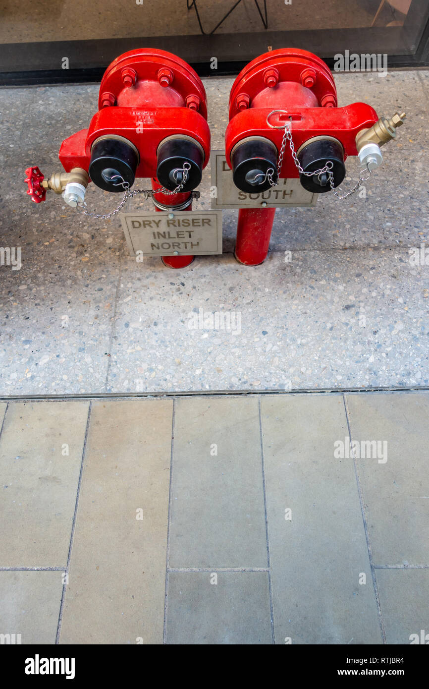 2 Contemporary Red Fire Hydrants and Dry Riser outside the Universal ...