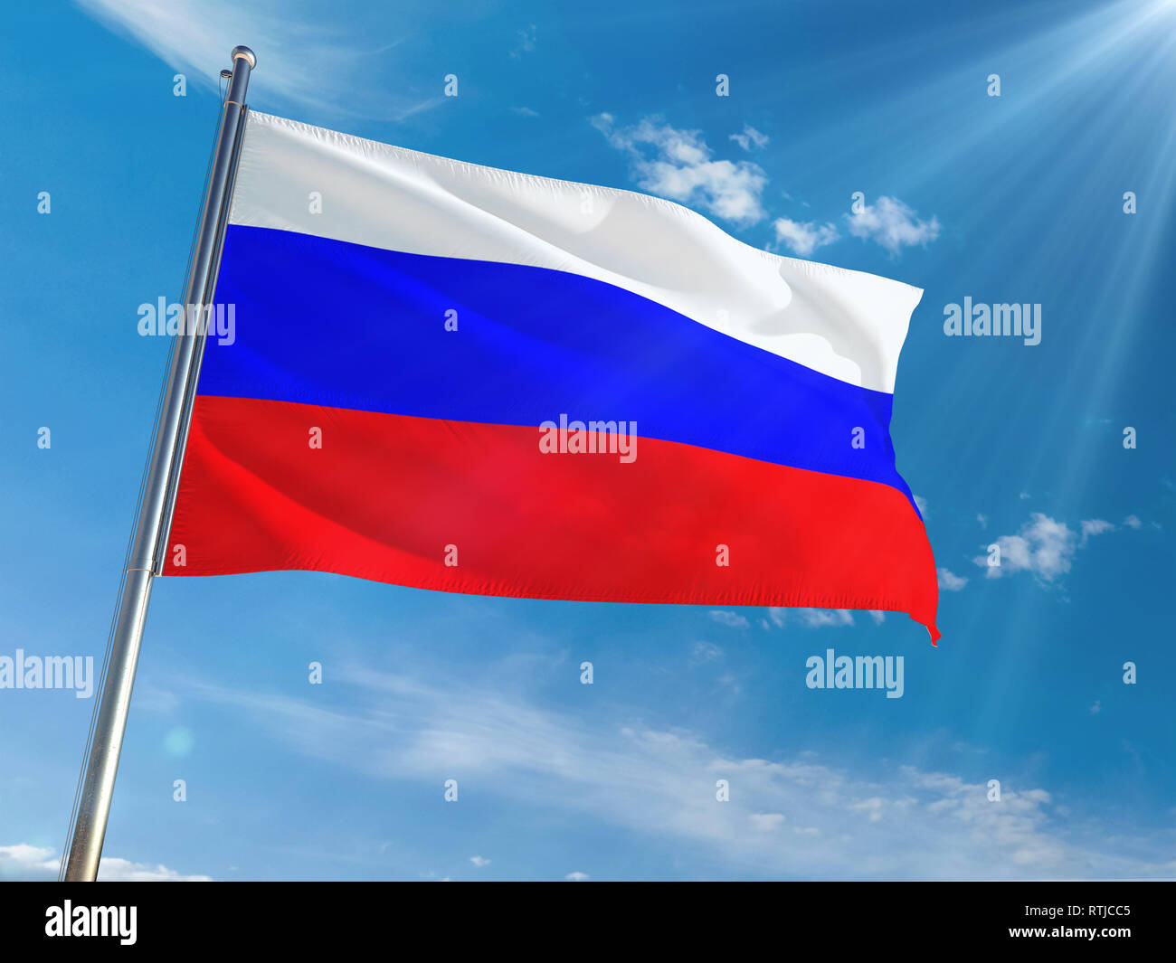 Russia National Flag Waving on pole against sunny blue sky background ...