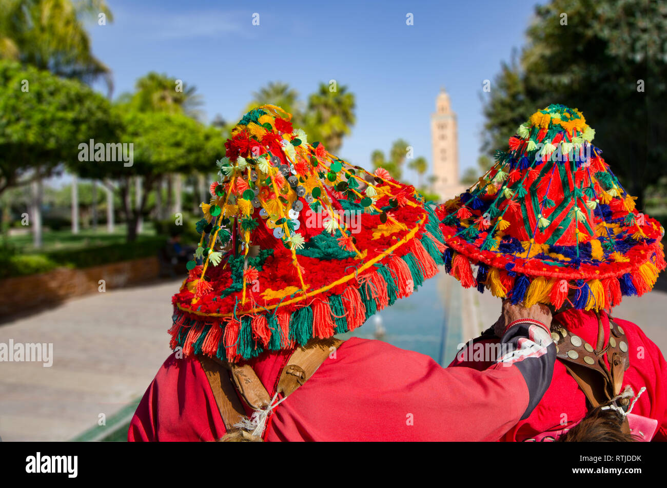 People with colorful hats in front of Koutoubia mosque in Marrakesh ...