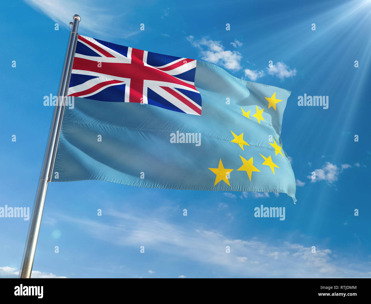 Tuvalu National Flag Waving on pole against sunny blue sky background ...