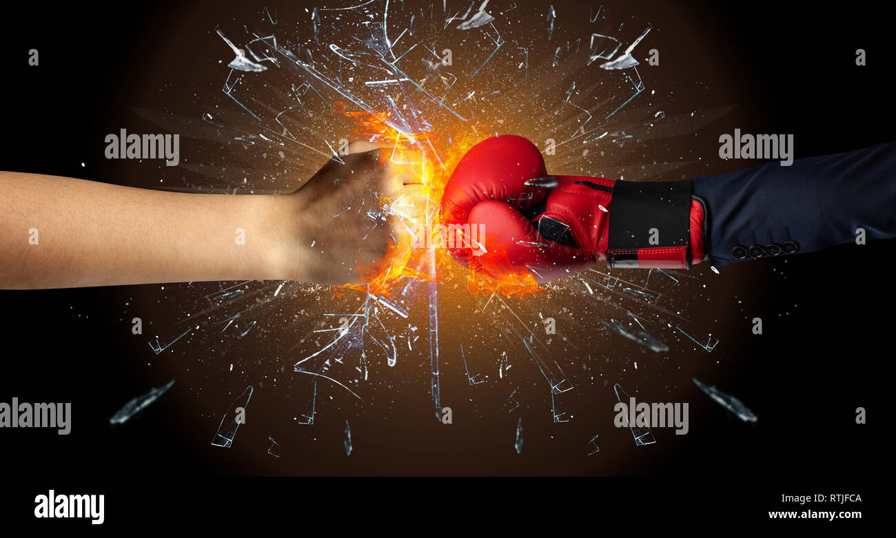 Two hands fighting and breaking a glass into small pieces Stock Photo ...