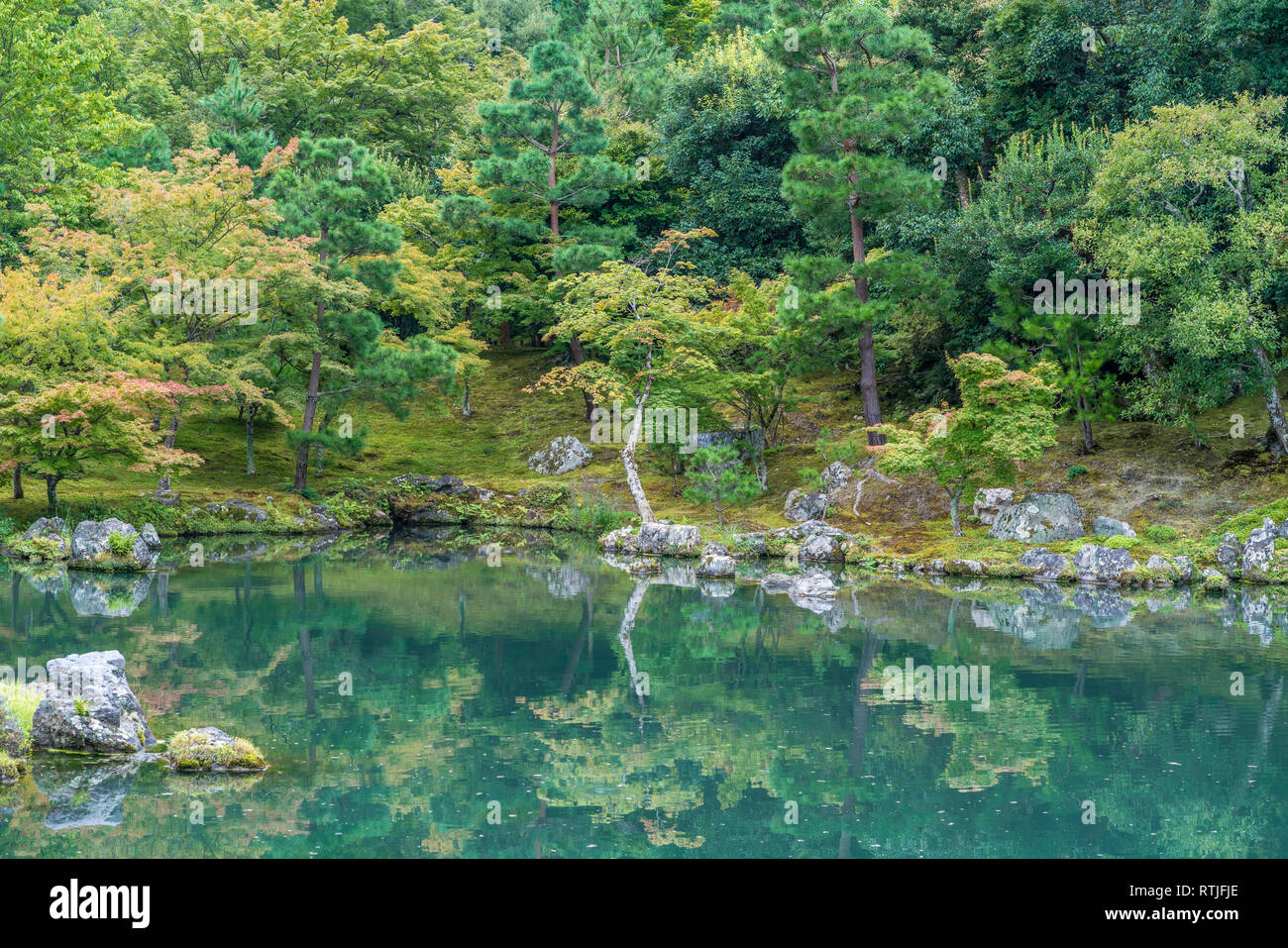 The garden of Tenryu-ji temple, lake reflections. Designated as a ...