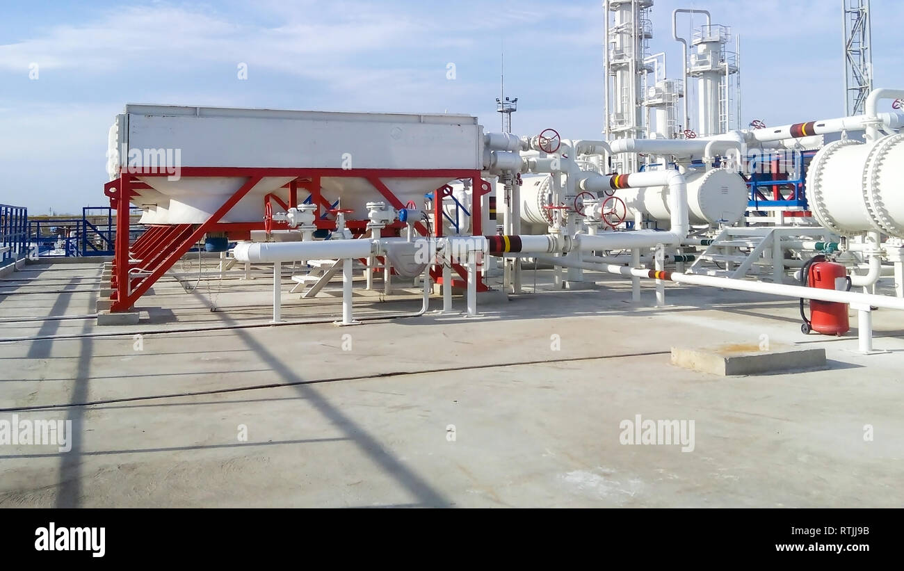 The oil refinery. Equipment for primary oil refining Stock Photo - Alamy