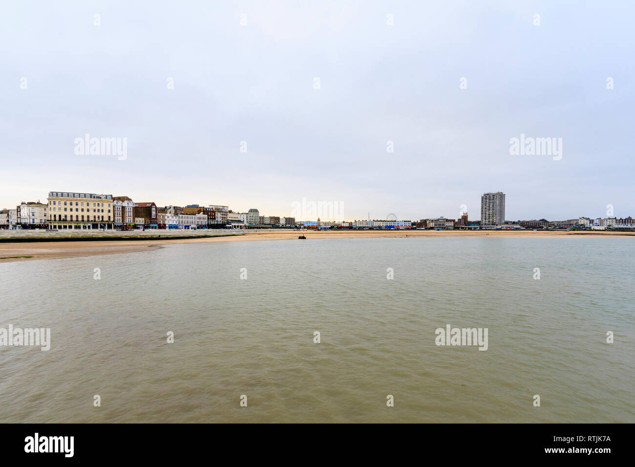 Margate seafront, view from calm sea of resort town coastline with ...