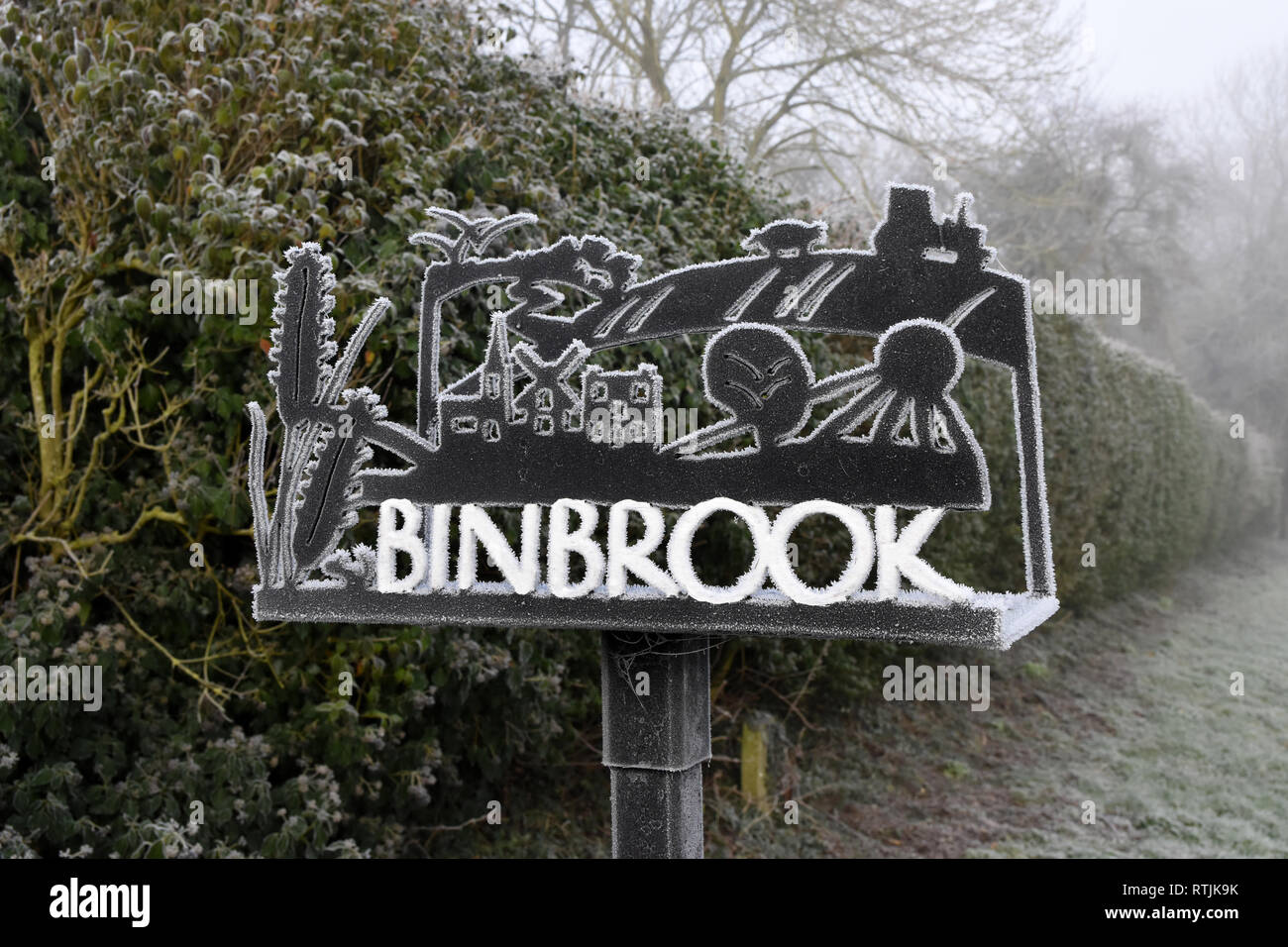 Binbrook village sign with frost Stock Photo - Alamy