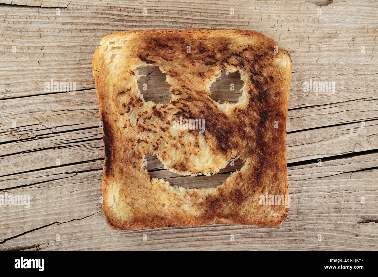 Happy toast on an old wooden board Stock Photo - Alamy
