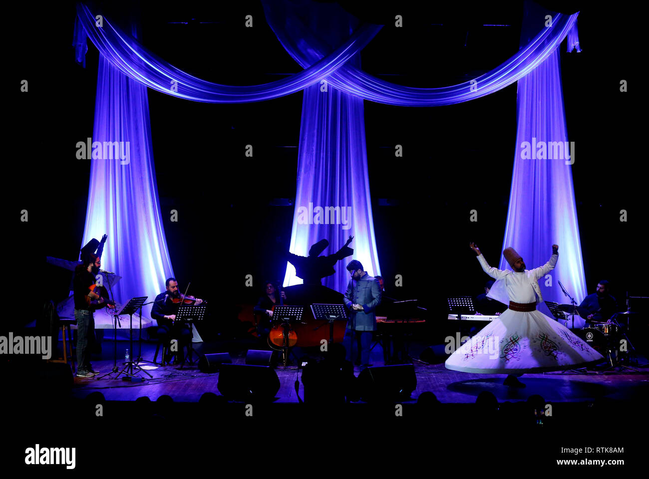 Beirut, Lebanon. 1st Mar, 2019. Sufi singer Sheikh Ahmed Hawili and his ...