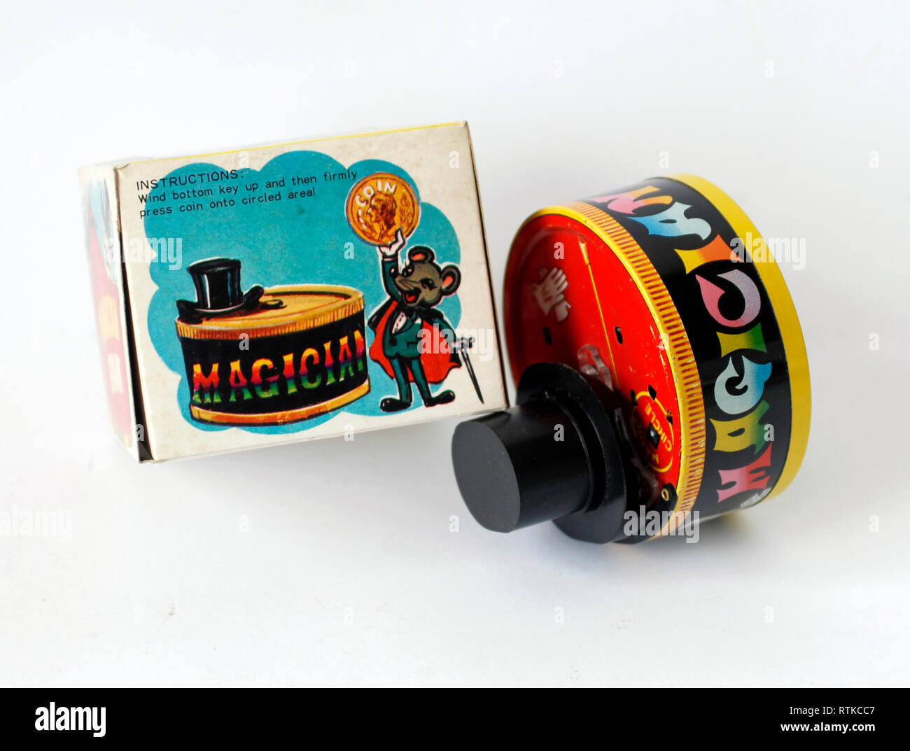 Vintage tin toy magician bank Stock Photo - Alamy