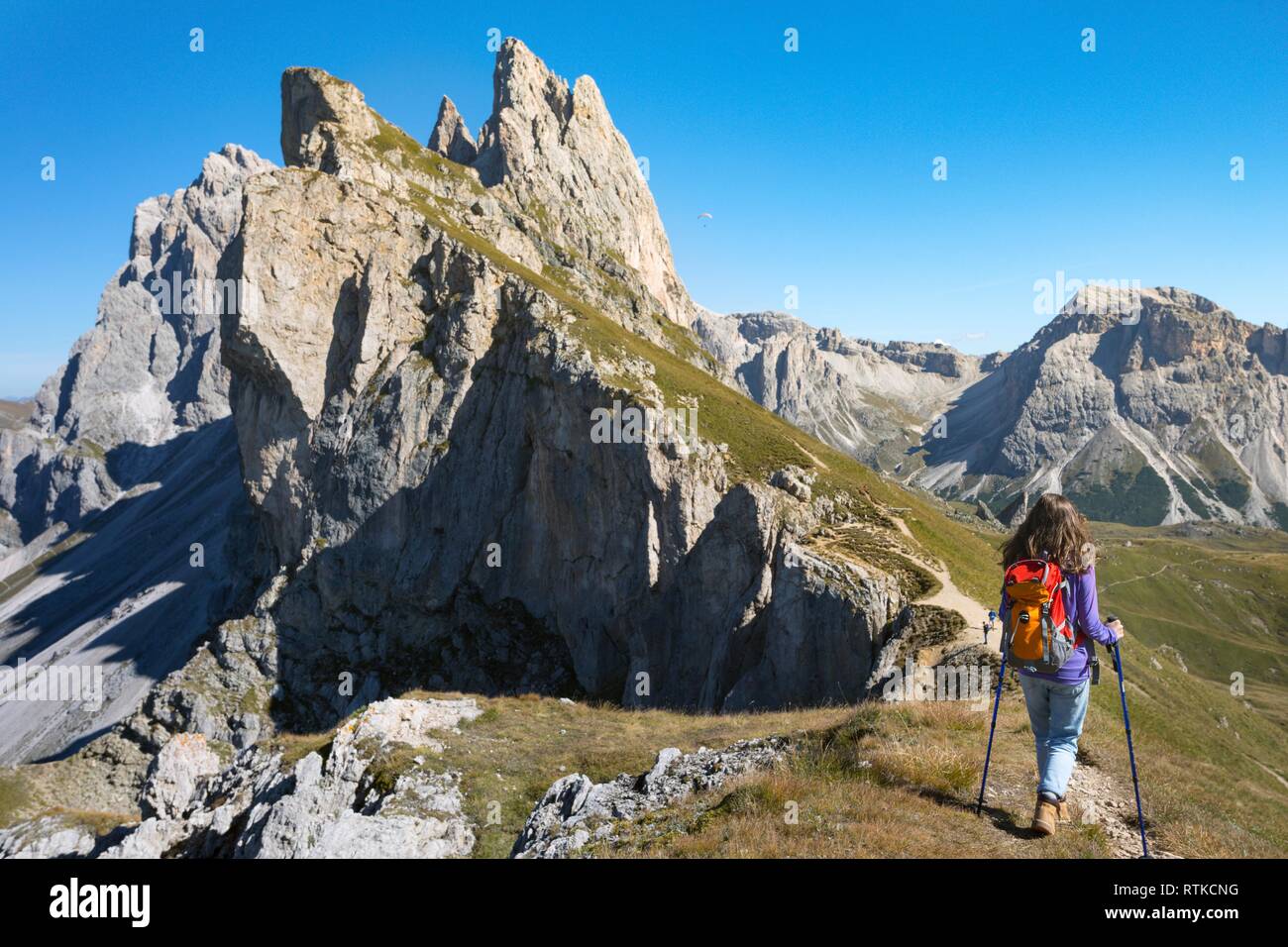 girl hiker at the mountains Dolomites and views of the valley, Italy ...