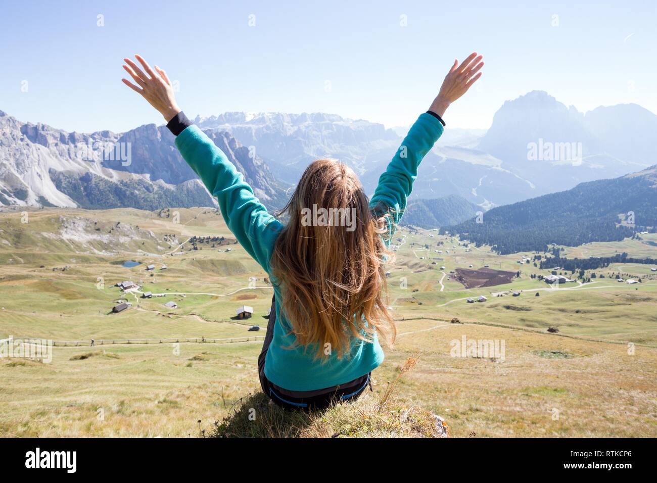 girl hiker at the mountains Dolomites and views of the valley, Italy ...