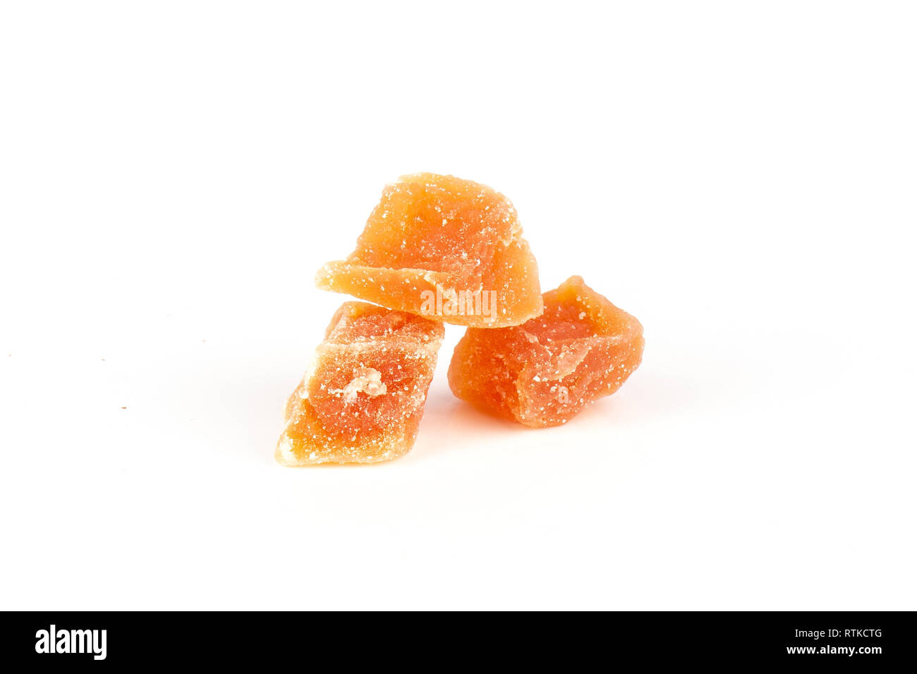 Group of three slices of dry papaya isolated on white background Stock ...