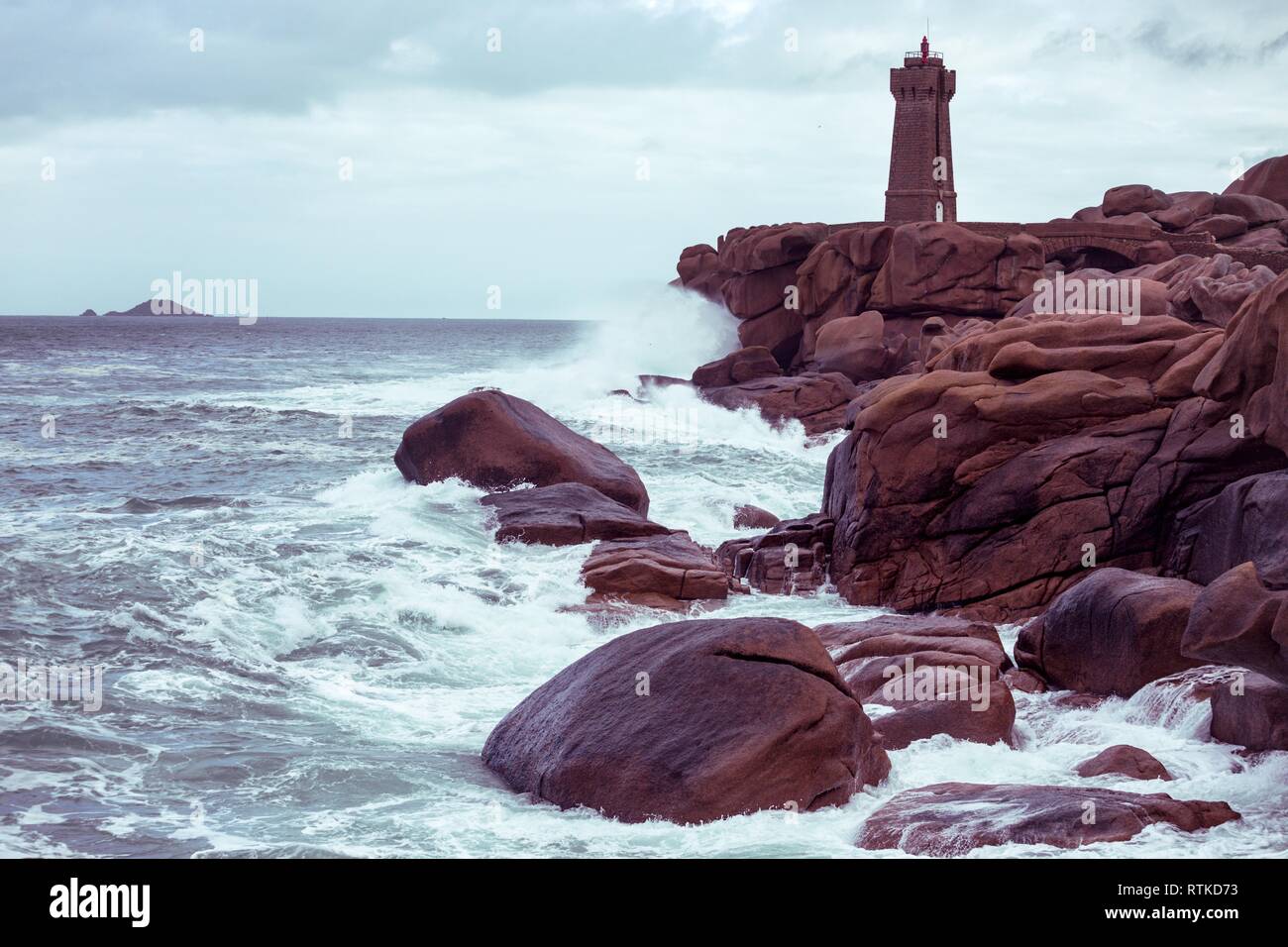 lighthouse Phare de Men Ruz and typical Brittany coast at the Tregastel ...